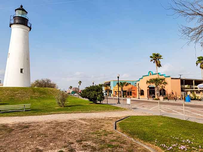 The lighthouse standing tall against blue skies offers views that'll make you forget every landlocked worry you've ever had.