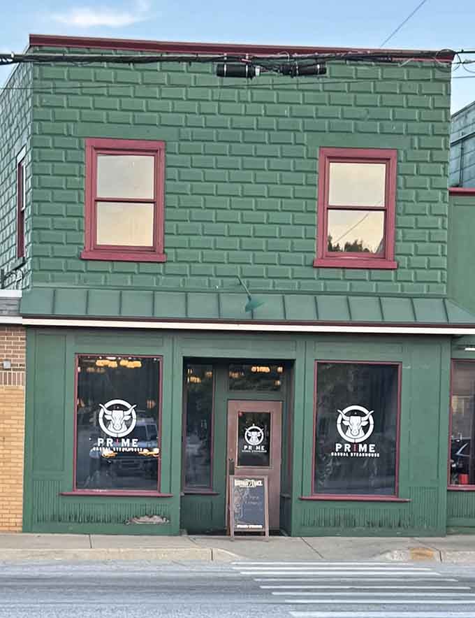 The mint-green brick and pink trim create a quirky, unforgettable exterior that promises personality matches the quality inside.