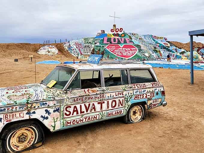 The painted van announces this desert art installation louder than any billboard ever could dream of doing.