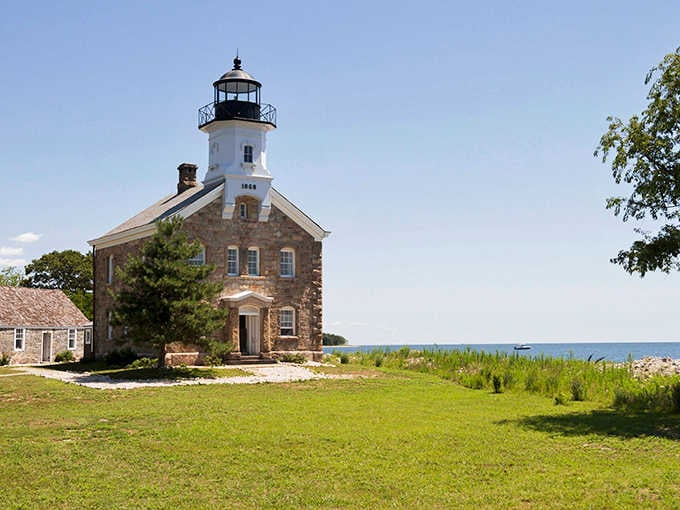 The rugged stone exterior and manicured lawn create a contrast that's purely, wonderfully Connecticut through and through.