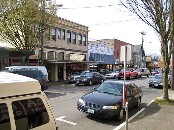 Classic small-town architecture lines quiet streets where neighbors still know each other's names and wave hello.