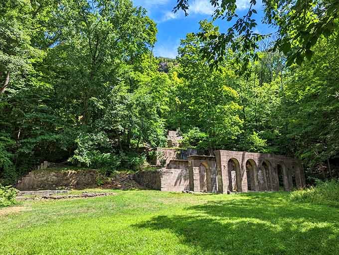 Ancient stone arches hidden in the forest feel like stumbling upon a secret garden that time forgot to erase.