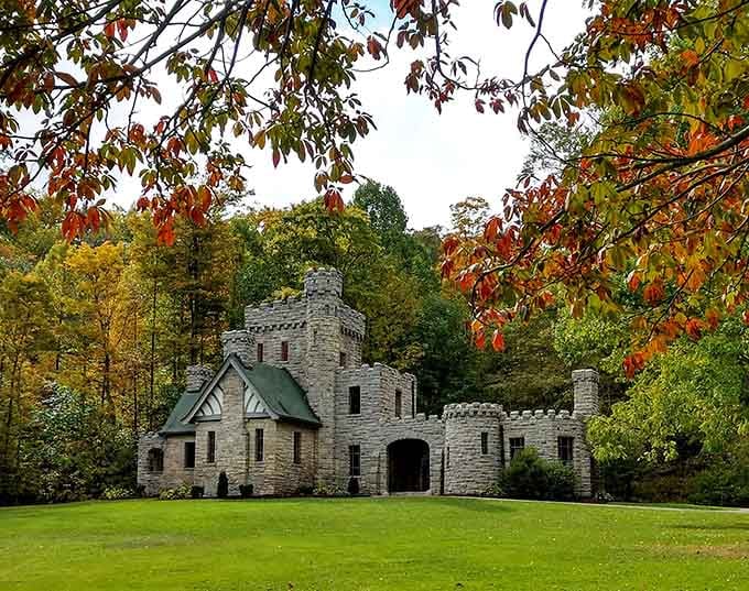 Medieval dreams come alive where castle towers peek through summer's lush green canopy.