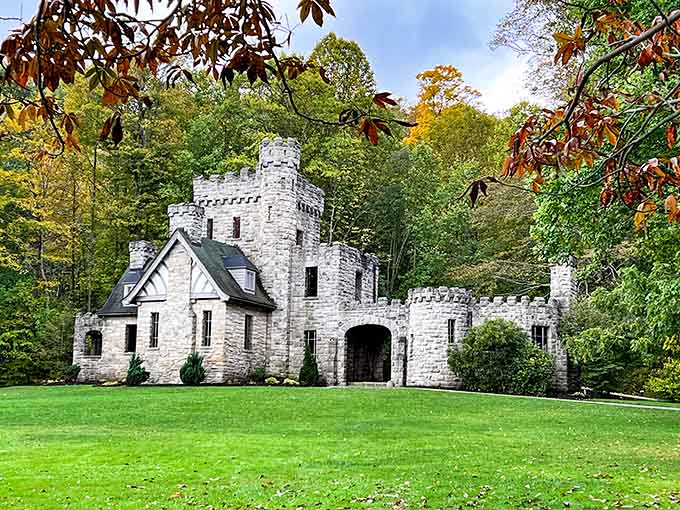 This pale stone gatehouse sits waiting in the woods like Cinderella's castle forgot to invite the rest of the palace.