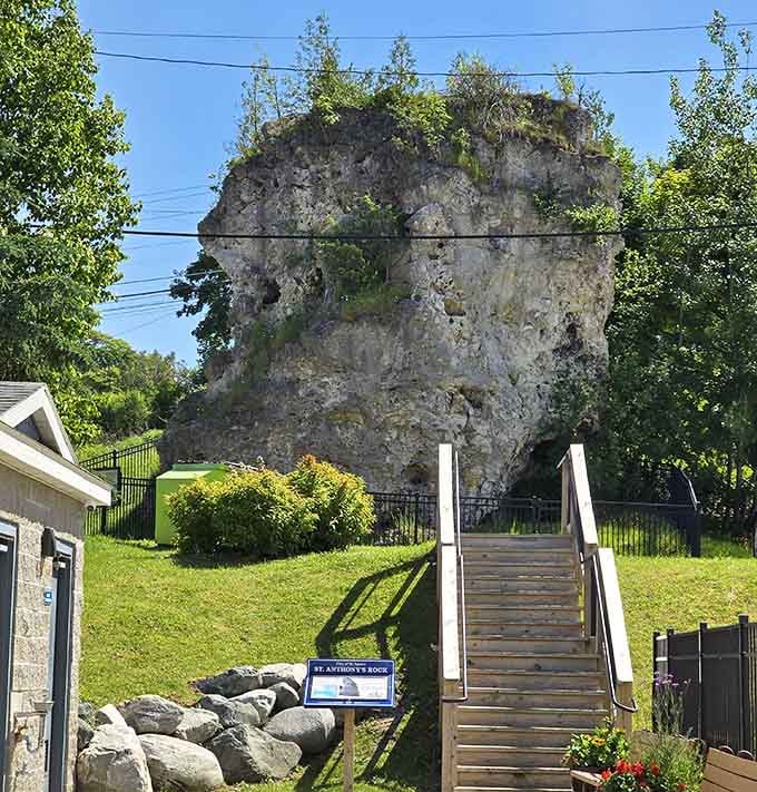 Wooden stairs invite you up to meet this ancient sentinel that's been watching over the town for countless generations.