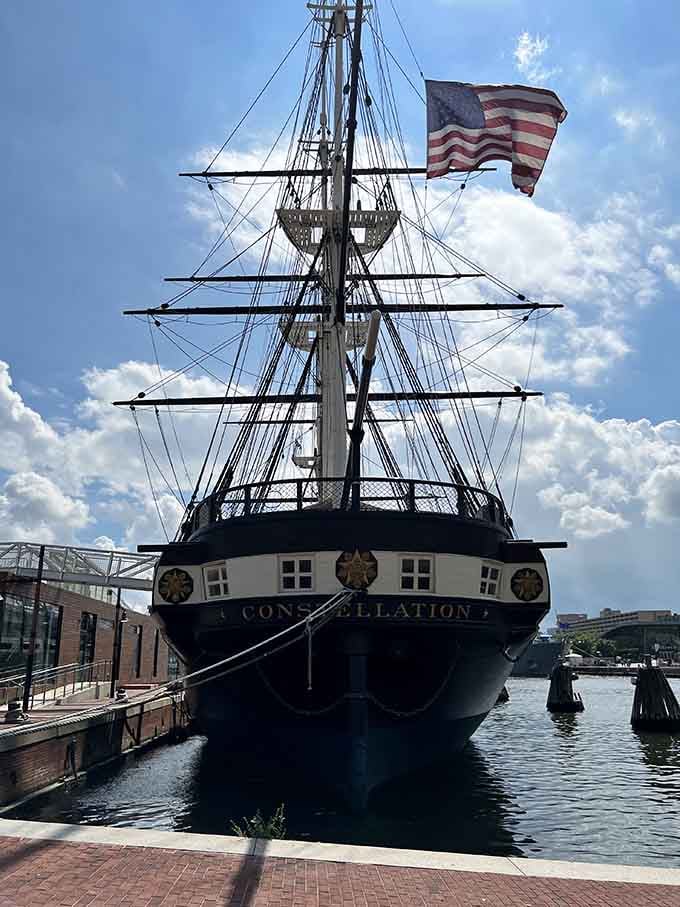 The USS Constellation's proud masts and rigging tower above the harbor like a ghost from another century.