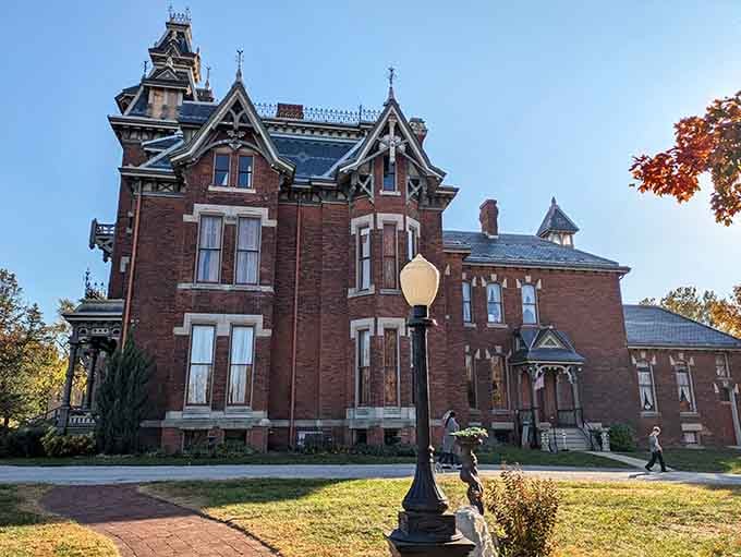 Victorian Gothic architecture at its finest, with that dramatic tower reaching skyward like something from "The Addams Family."