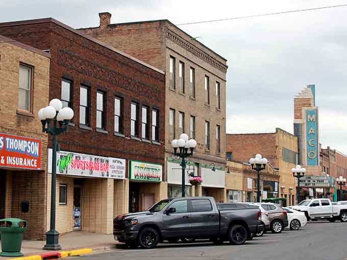 Classic streetlights and vintage theater marquees line streets where entertainment doesn't require draining your savings account every weekend.