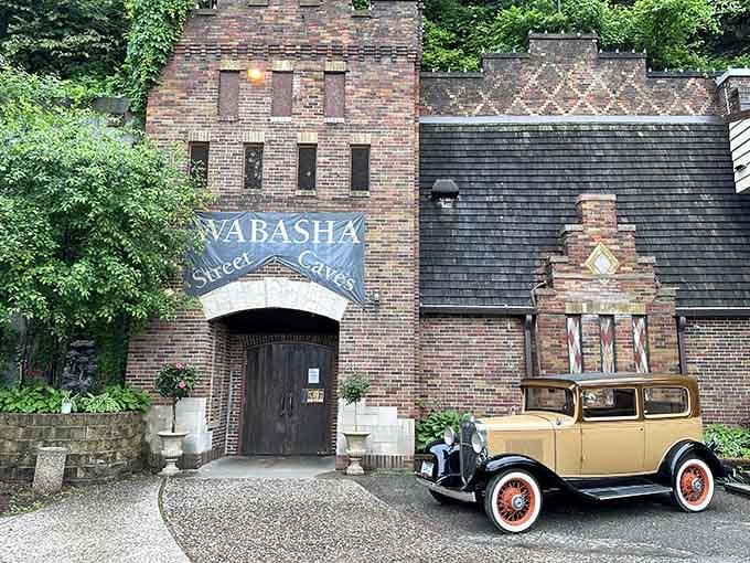 That vintage automobile parked outside the brick cave entrance sets the perfect speakeasy scene from Prohibition days.