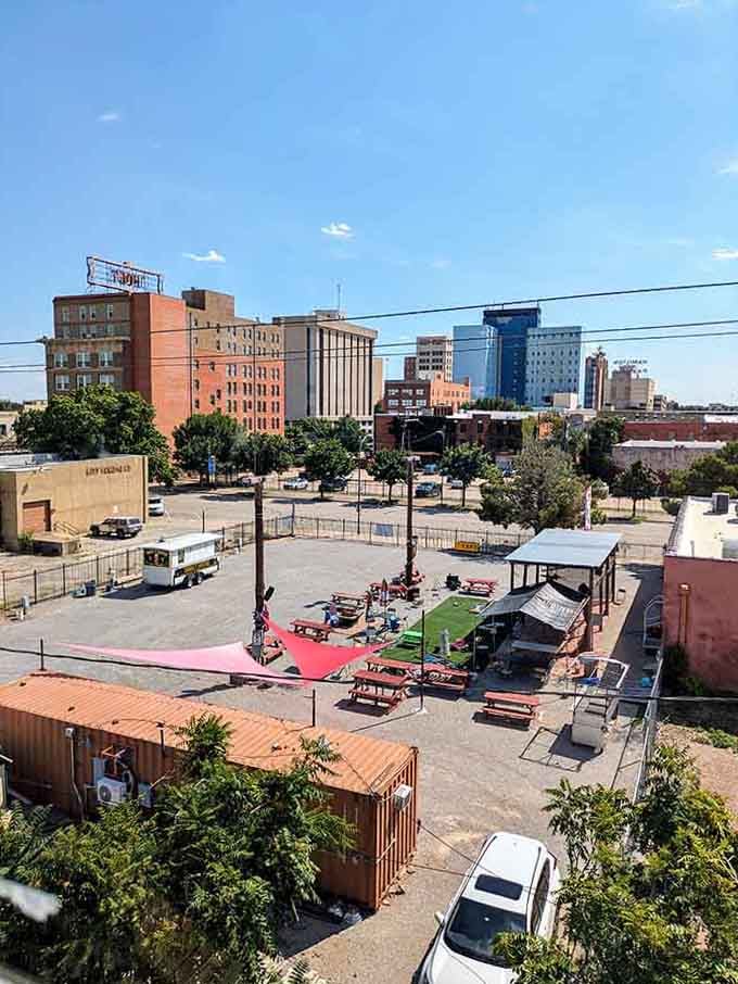 Outdoor gathering spaces with picnic tables prove community happens best when neighbors can actually see each other's faces.