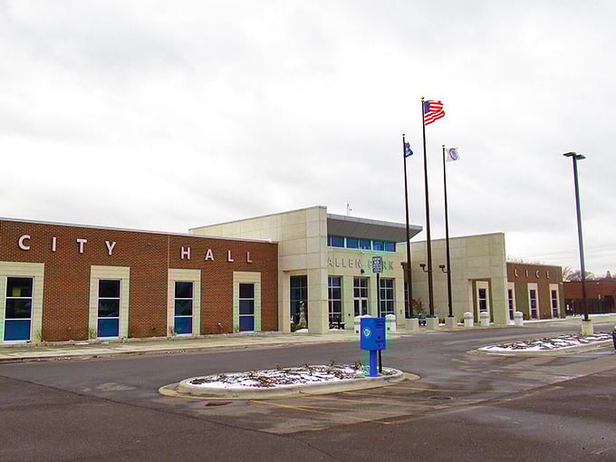 Clean modern lines define civic pride here, where even the fire hydrant looks ready for its close-up against brick and glass.