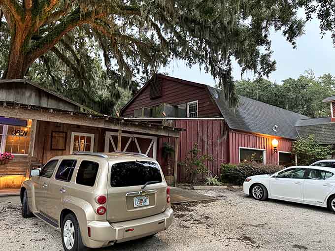 The rustic red barn glowing at dusk looks like something Norman Rockwell would've painted between dinner courses.