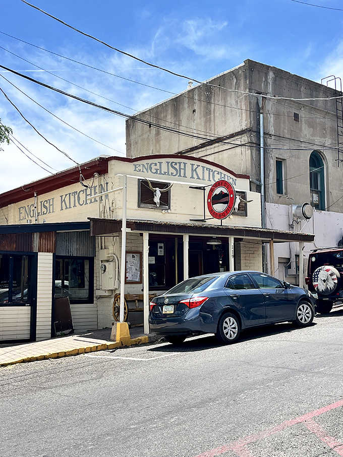 The weathered building with its vintage signage looks like it's been feeding hungry cowboys for generations.