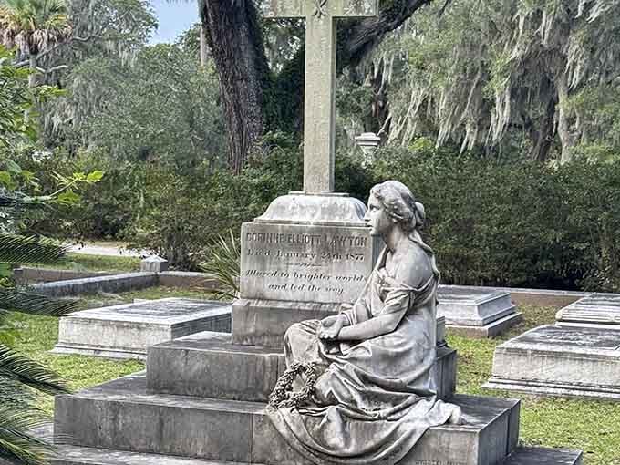 This sorrowful statue keeps watch over weathered stones, her eternal vigil a touching reminder of love that transcends time.