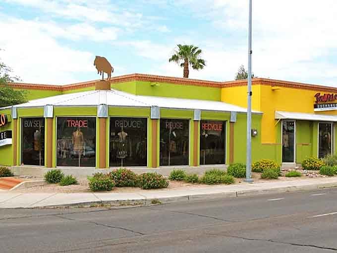 Those colorful window signs spell out the store's philosophy: buy, sell, trade, reduce, reuse, and look fabulous doing it.
