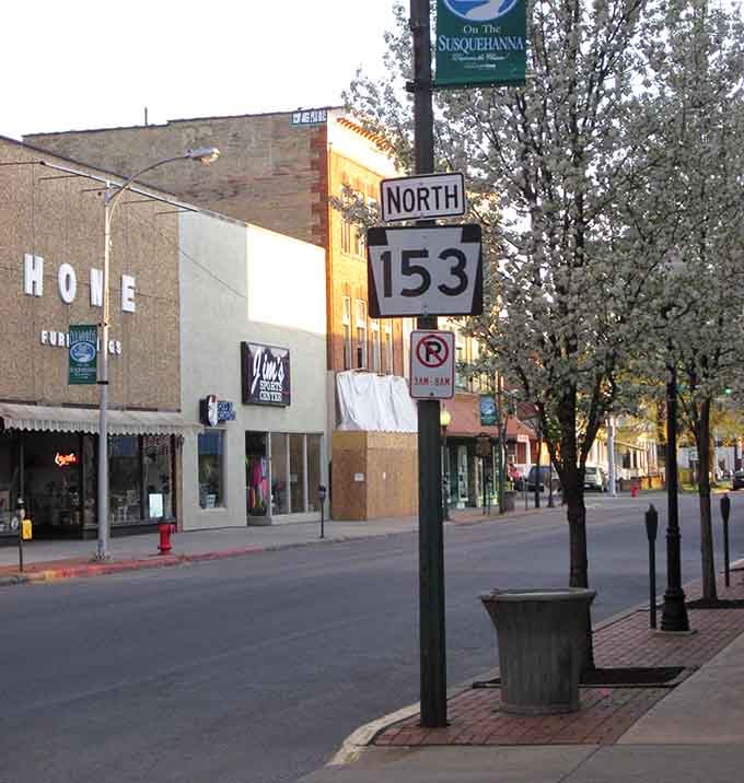 Route 153 points the way through town where mountains stand watch like protective grandparents over their beloved community.