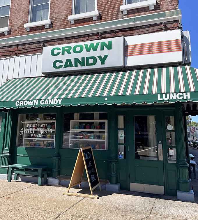 The vintage signage and traditional facade whisper sweet promises of handmade chocolates and ice cream sundaes piled impossibly high.