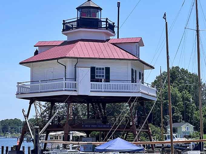 The red roof catches your eye first, but that wraparound porch steals your heart like a first date.