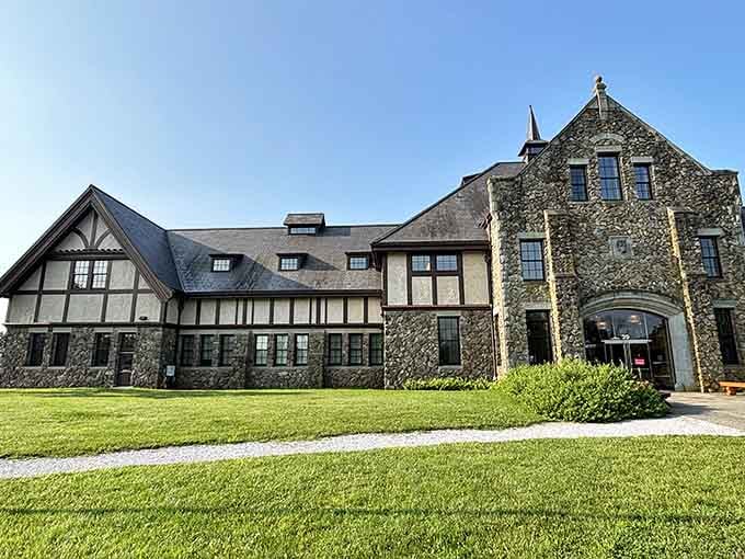 Sunlight bathes the manicured lawn and stately architecture, showcasing the beautiful grounds where genius once walked daily.