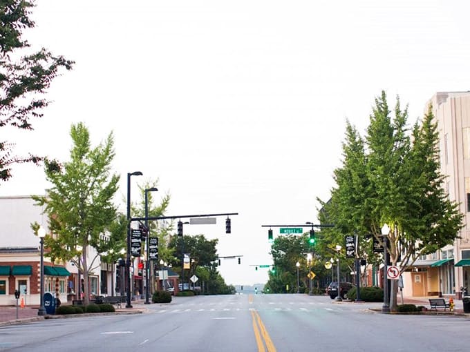 Early morning calm on Florence's main street proves small-town living doesn't mean missing out on charm.