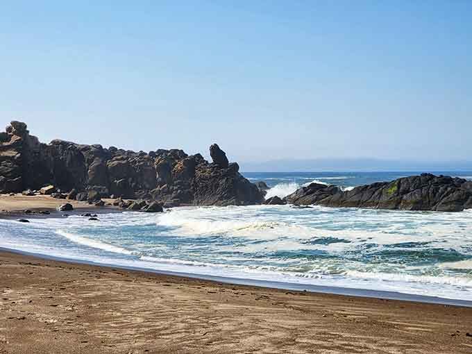Waves rolling toward shore create that mesmerizing rhythm that makes you forget you had other plans today.