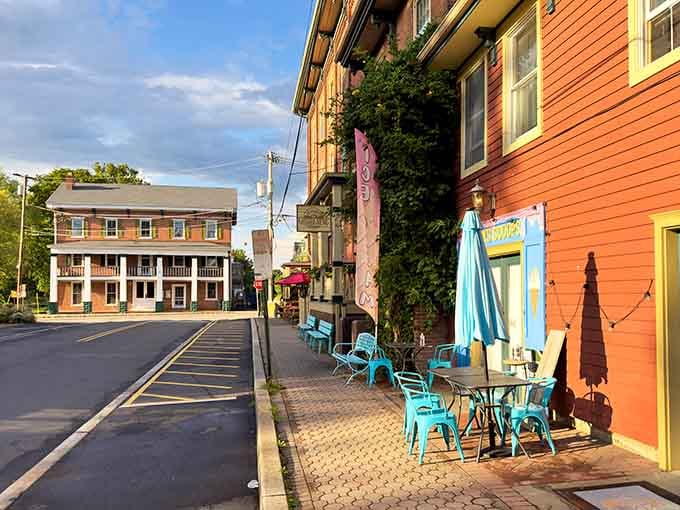 That orange building practically glows in the afternoon light, inviting you to grab a sidewalk table and stay awhile.
