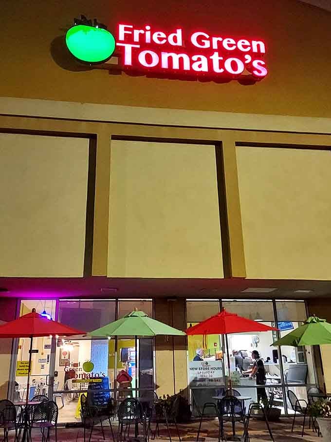 Those cheerful outdoor umbrellas hint at the festive atmosphere waiting inside this dedicated temple of fried green tomatoes.