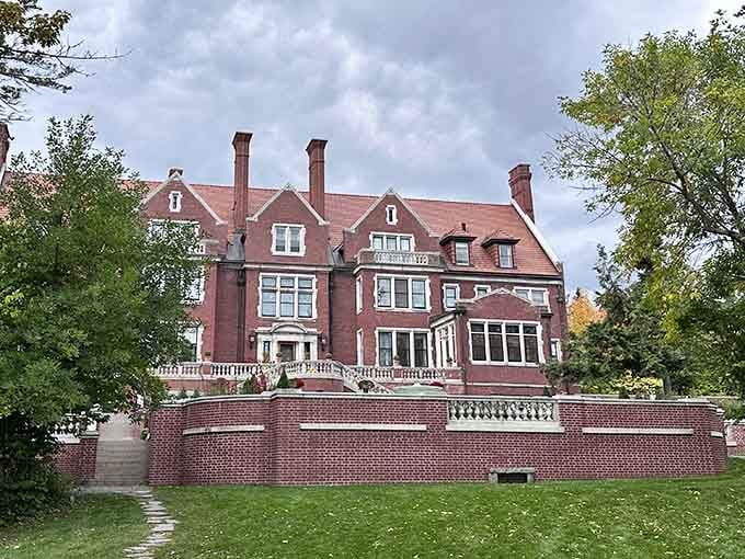 The terraced grounds and imposing facade create an atmosphere where beauty and mystery walk hand in hand.