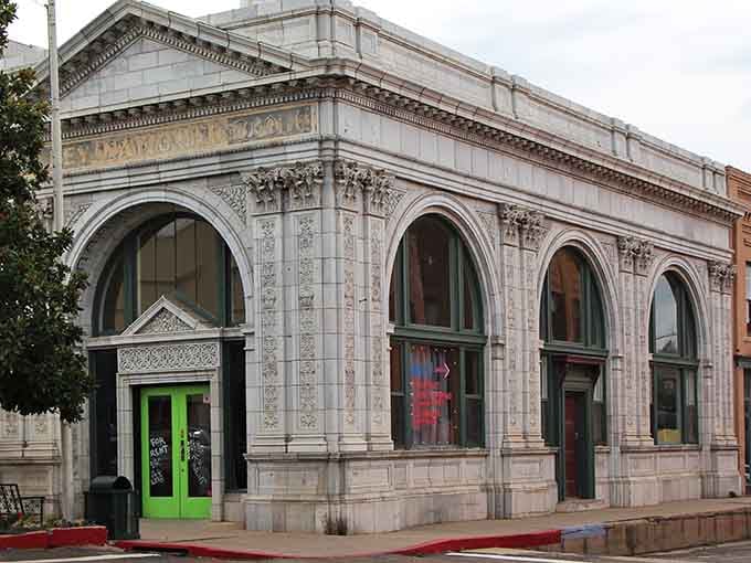 Ornate arches and detailed stonework showcase the craftsmanship of a bygone era, beautifully maintained today.