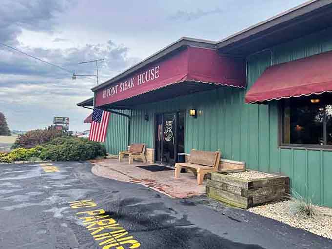 Wooden benches out front invite you to relax before diving into serious steaks at this countryside gem.