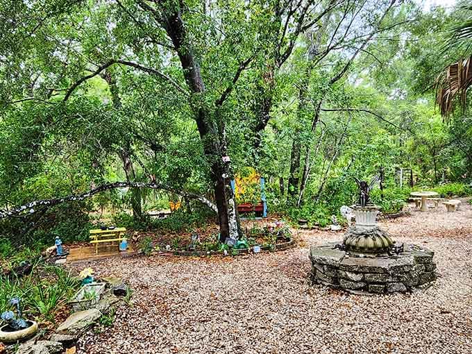 That stone fountain surrounded by whimsical decorations creates a peaceful gathering spot for believers in everyday magic.