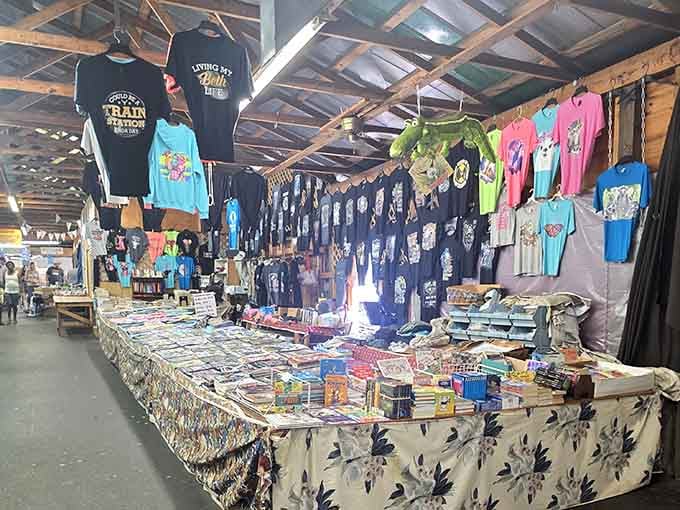 Vintage t-shirts hanging like colorful prayer flags celebrate decades of pop culture and forgotten band tours.