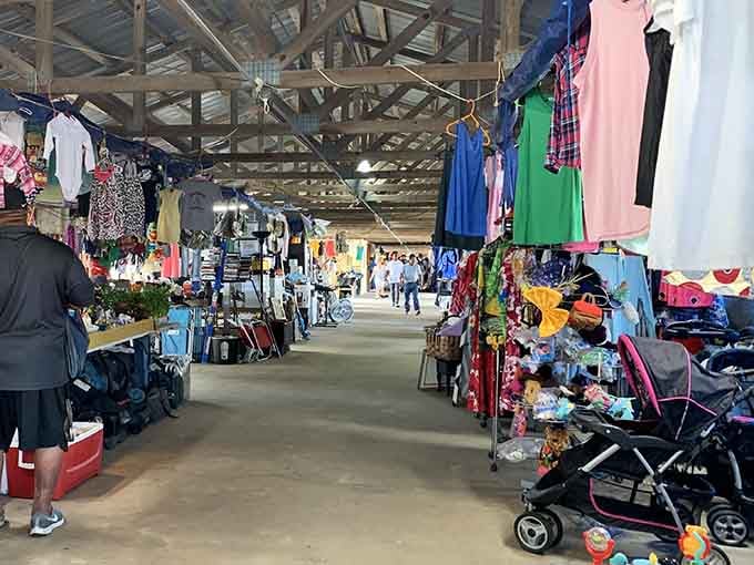 Sunlight filters past hanging garments in this sprawling space that feels like exploring your stylish friend's massive closet.