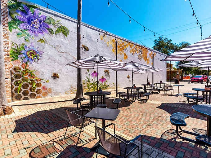 Those striped umbrellas and brick pavers create a charming European cafe vibe right here in the Panhandle.
