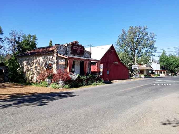 This weathered red building wears its age proudly, standing as a testament to small-town California's enduring character and resilience.