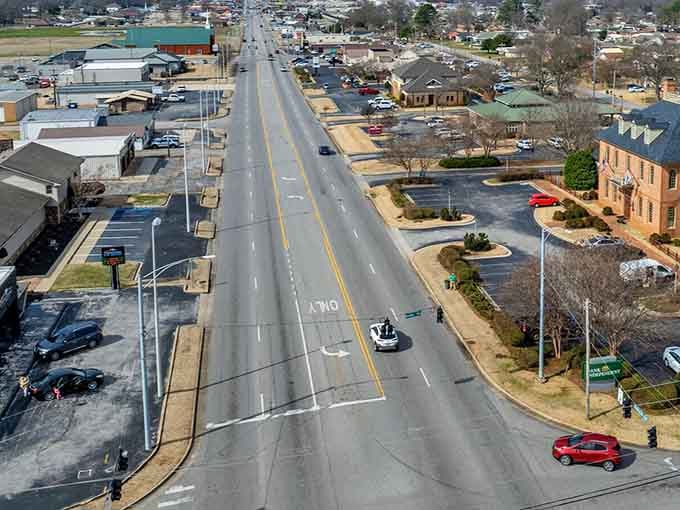 Muscle Shoals wide main street shows off the town's relaxed pace and mountain charm on a quiet afternoon.