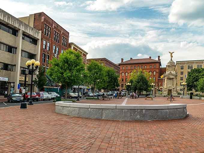 Brick plaza and historic buildings create New Britain's welcoming downtown where affordable living meets genuine New England charm perfectly.