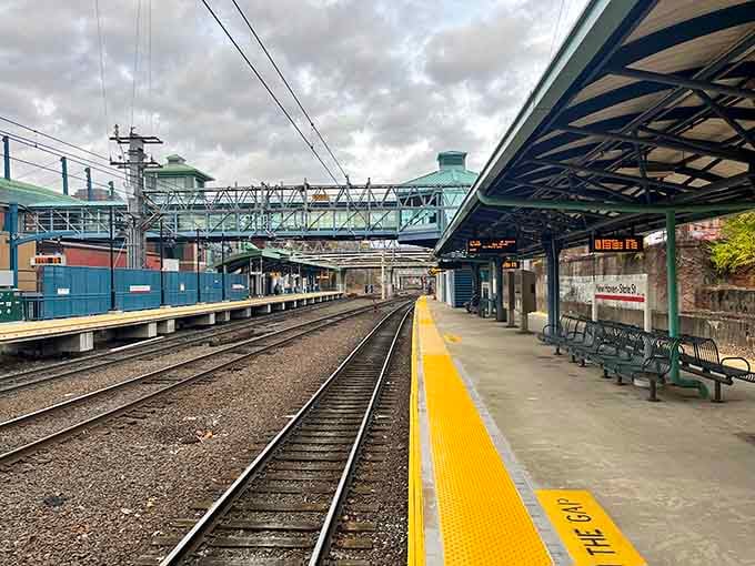 The covered platform stretches into the distance, where countless travelers have waited for their next great adventure.