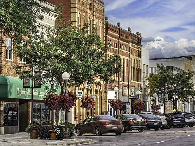 Hanging flower baskets add bursts of color to historic facades, proving small towns know how to dress up.