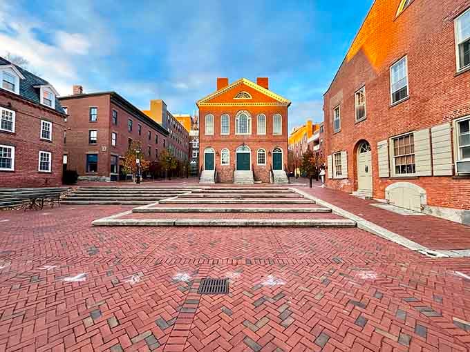 Golden afternoon light bathes the colonial building, making those symmetrical windows glow like they're showing off a bit.