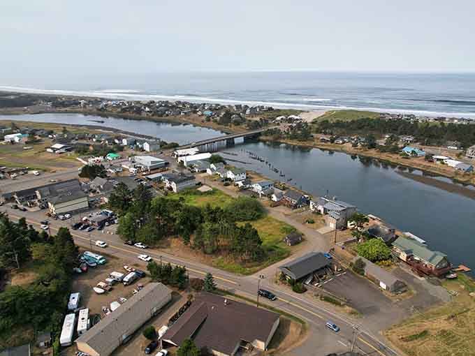 Rivers wind through town like nature's highways, connecting forest to ocean in one spectacular watercolor painting.