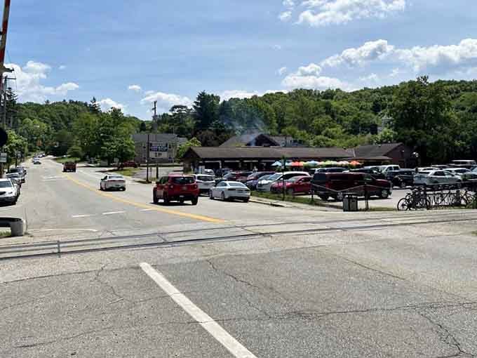 Rolling hills embrace the town like a protective hug, reminding you that geography can be downright affectionate when it wants.