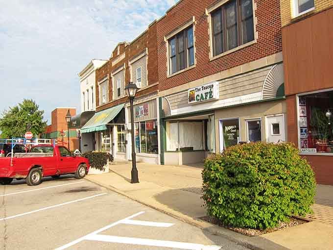 Main Street storefronts with vintage lampposts invite leisurely window shopping, where every store owner knows your name by heart.
