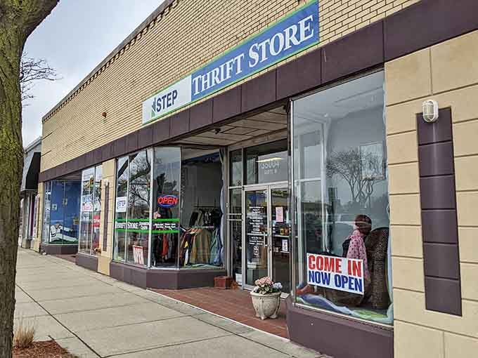 Large windows reveal glimpses of treasures within, while that welcoming storefront invites browsers to step inside and explore.