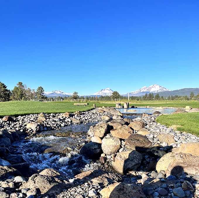 Three mountain sisters stand tall beyond the water, giving this charming town its name and unforgettable backdrop.