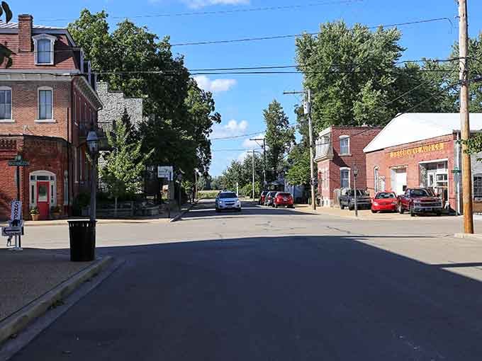 Wide streets invite leisurely strolls past buildings that remember when this corner was the center of everything important.