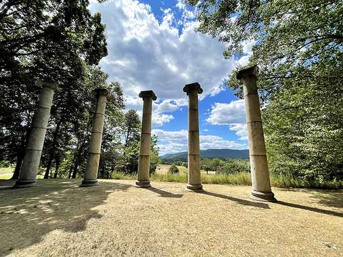 Classical columns frame Hudson Valley views like nature's own picture frame, perfect for contemplating life's big questions.