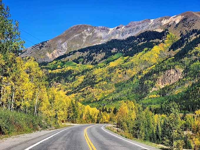 The Million Dollar Highway lives up to its name with every curve, delivering jaw-dropping vistas framed by golden fall foliage.