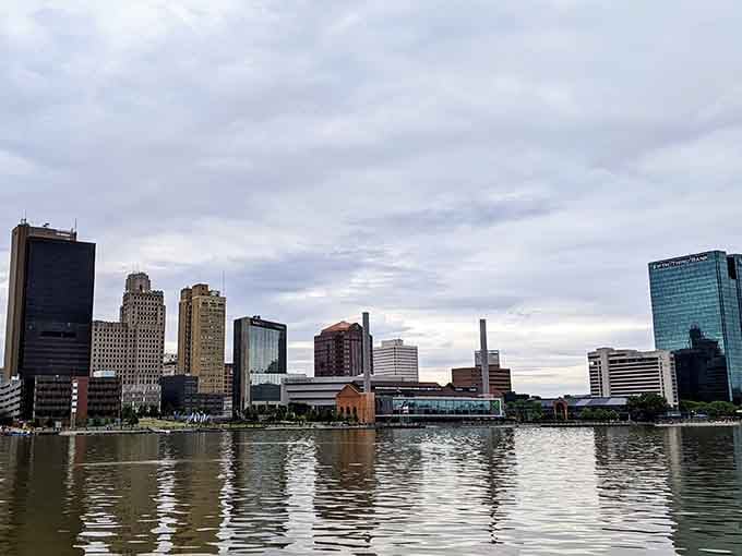 Toledo's waterfront skyline reflects in calm waters, offering big-city views at prices that won't give you heart palpitations.