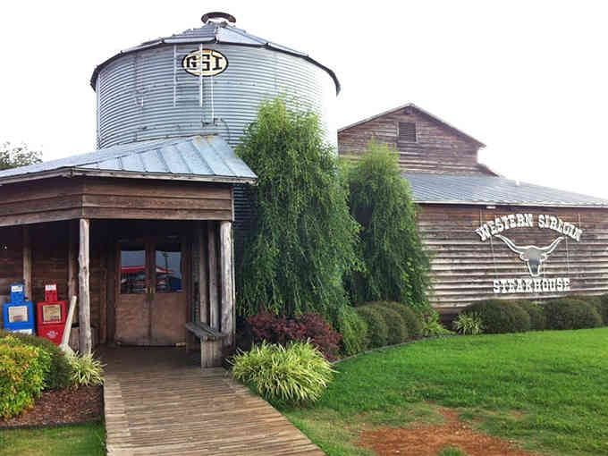 The wooden walkway leading to this rustic entrance feels like stepping back into simpler, more delicious times.